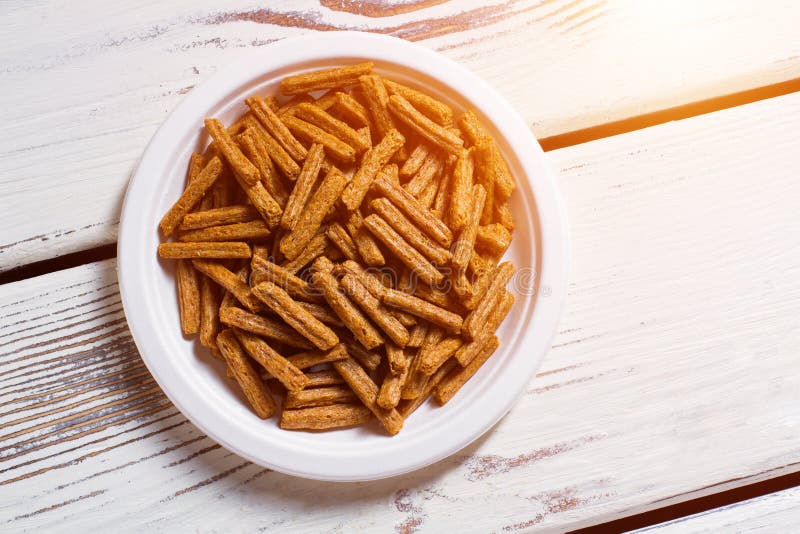 Cracker sticks on a plate. stock image. Image of dish - 70884627