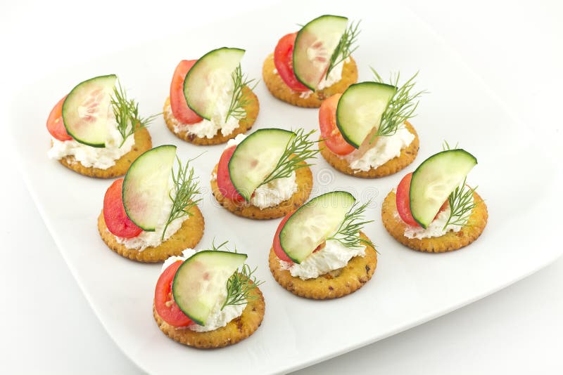 Crackers with Cheese Tomato Cucumber and Dill Stock Photo - Image of ...