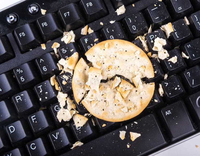 Crackers on the keyboard stock photo. Image of close - 64504476