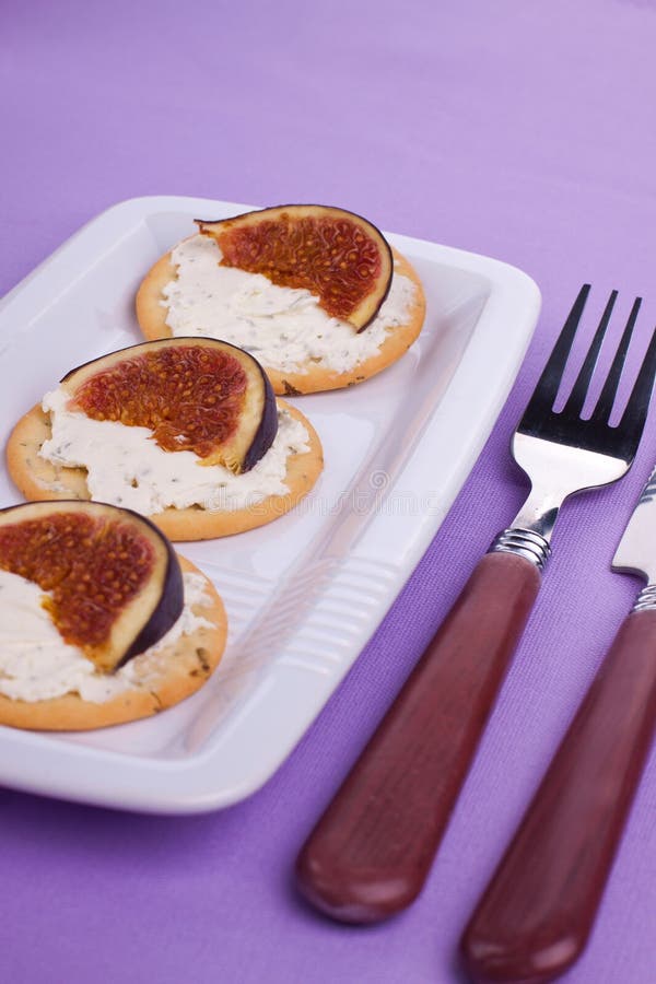 Crackers on plate stock photo. Image of delicious, cream - 26932638