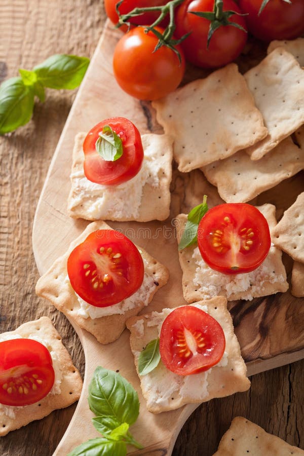 Crackers with Soft Cheese and Tomatoes. Healthy Appetizer Stock Image ...