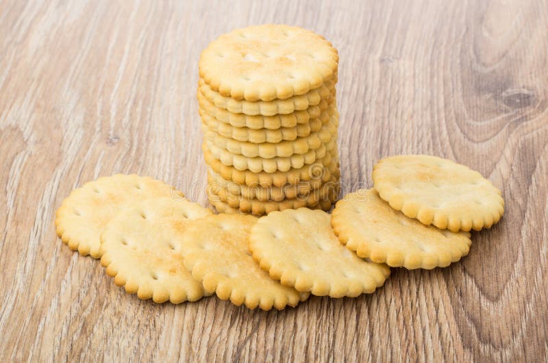 Crackers in Stack and Scattered on Table Stock Photo - Image of dessert ...