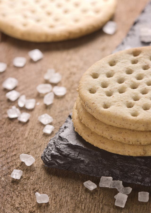 Crackers Stack Together on Black Stone, Wooden Background.Copy S Stock ...