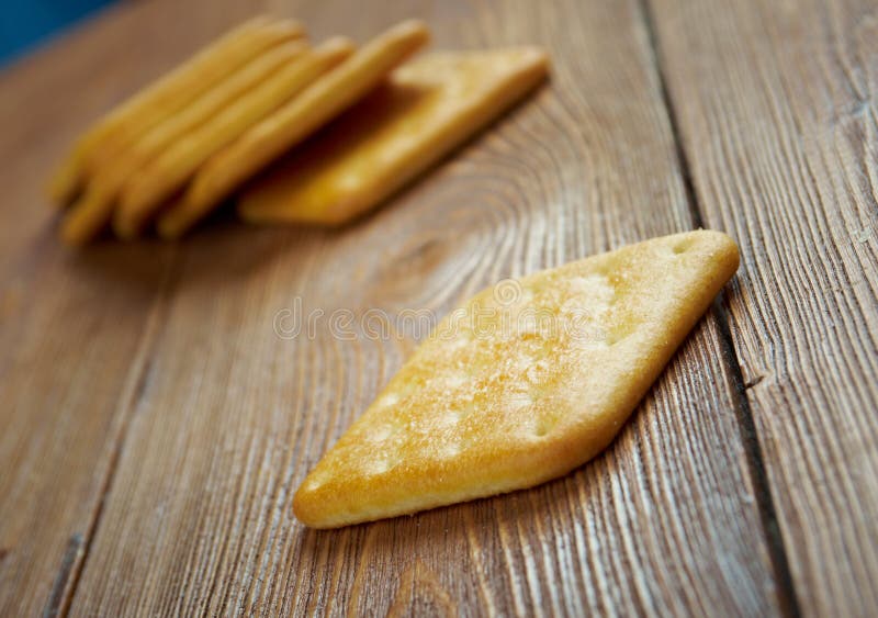 Crackers on wood table stock image. Image of salted, wooden - 40772133