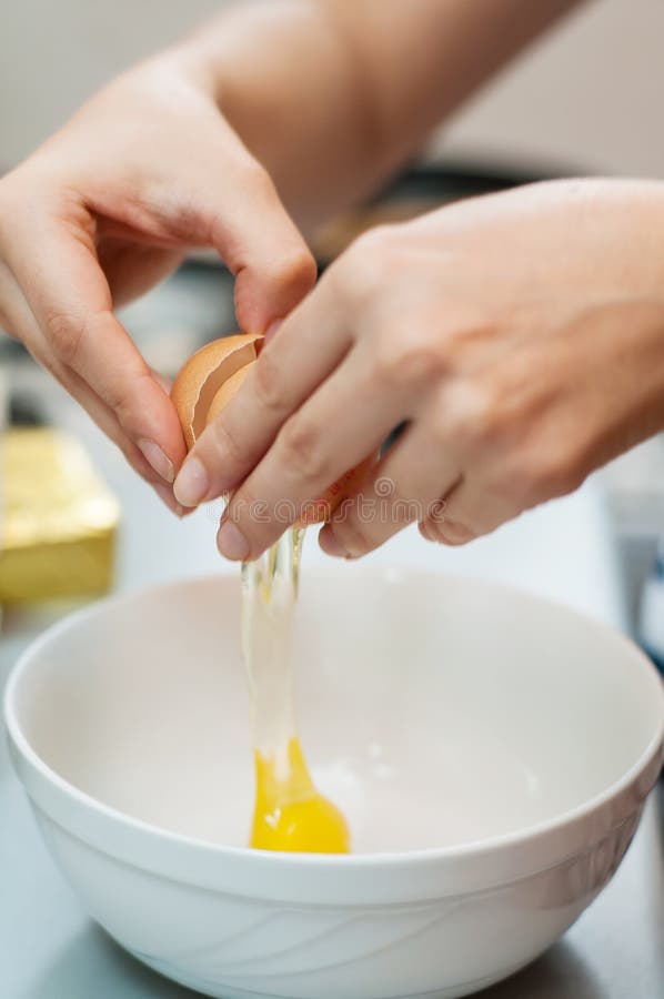 Cracking egg stock photo. Image of omelette, ingredient - 35933496