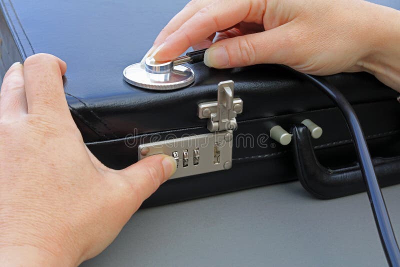 Cracking the Lock on a Briefcase. Stock Image - Image of suitcase ...