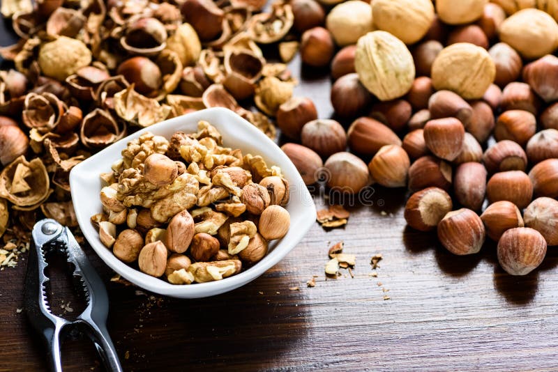 Cracking Nuts and Nutcracker Stock Image - Image of health, brown ...