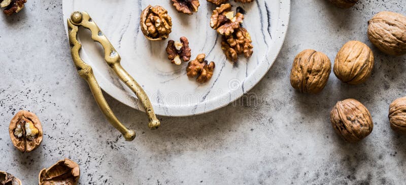 Cracking Walnuts stock photo. Image of nutshell, nutrient - 181065800