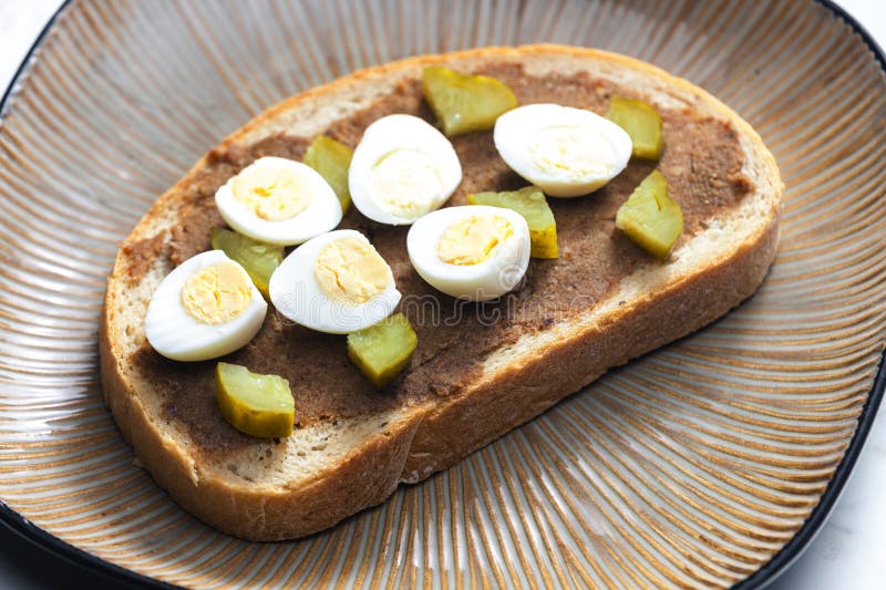 Cracklings Spread with Pickled Cucumber and Boiled Egg on Slice of ...