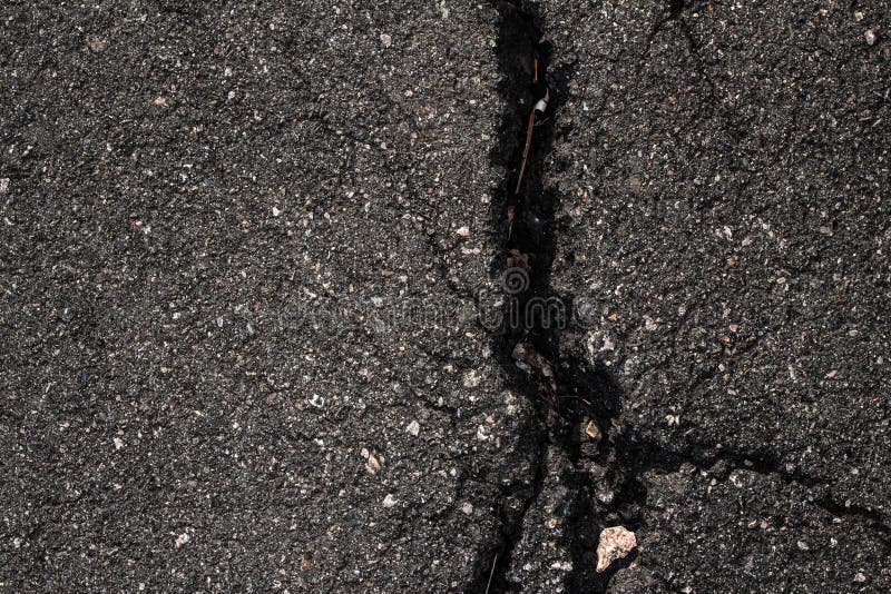 Cracks in the Asphalt. Texture of Bad Asphalt Stock Photo - Image of ...