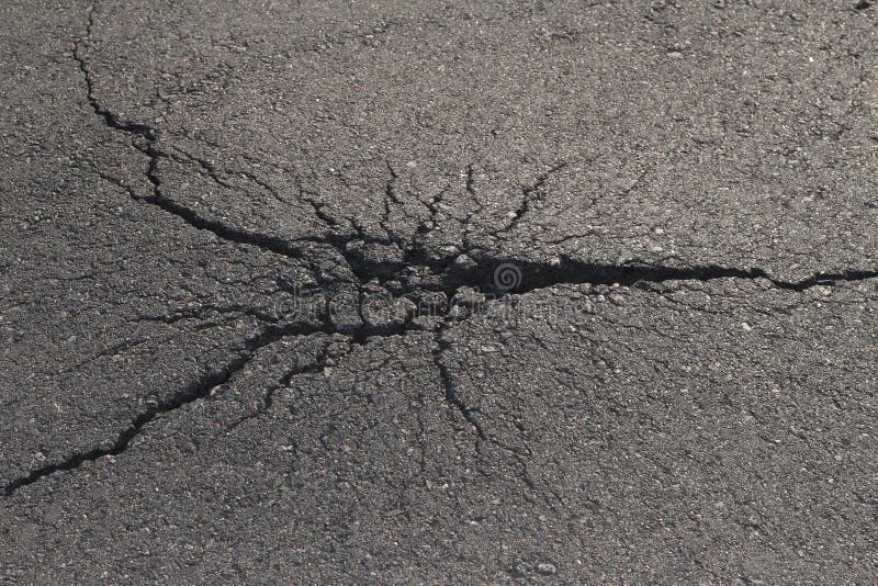 Cracks in the Asphalt. Texture of Bad Asphalt Stock Photo - Image of ...