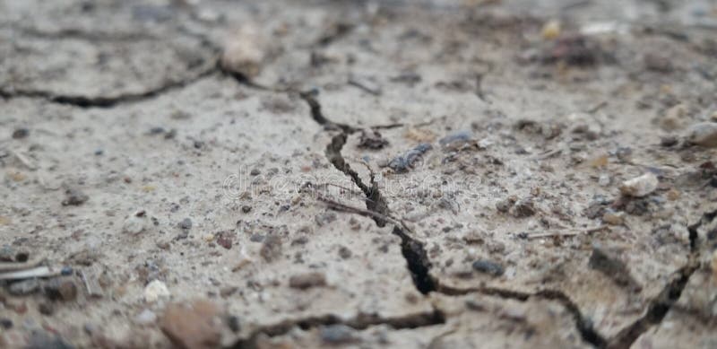 Cracks in the Dirt stock image. Image of rocks, cracks - 154594639