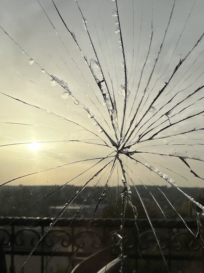 Cracks in a Double Glazed Window. Cracked Glass in a Window Against the ...