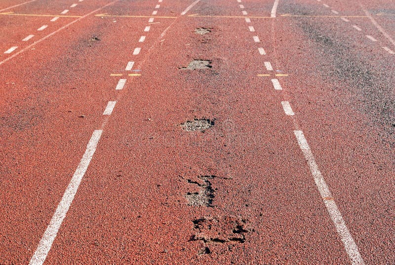 Cracks on running track stock image. Image of athlete - 95998061