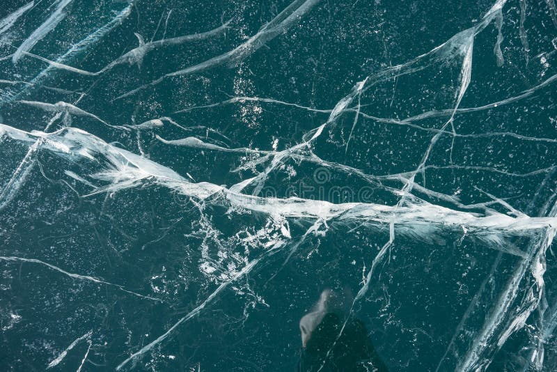 Cracks in Transparent Ice in Winter on the Lake Stock Photo - Image of ...