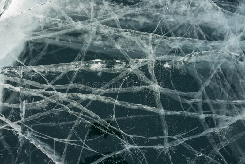 Cracks in Transparent Ice in Winter on the Lake Stock Photo - Image of ...