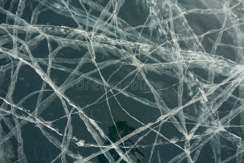 Cracks in Transparent Ice in Winter on the Lake Stock Photo - Image of ...