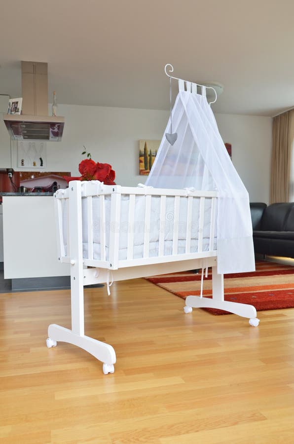 Cradle in the living room stock photo. Image of elegant - 81494424