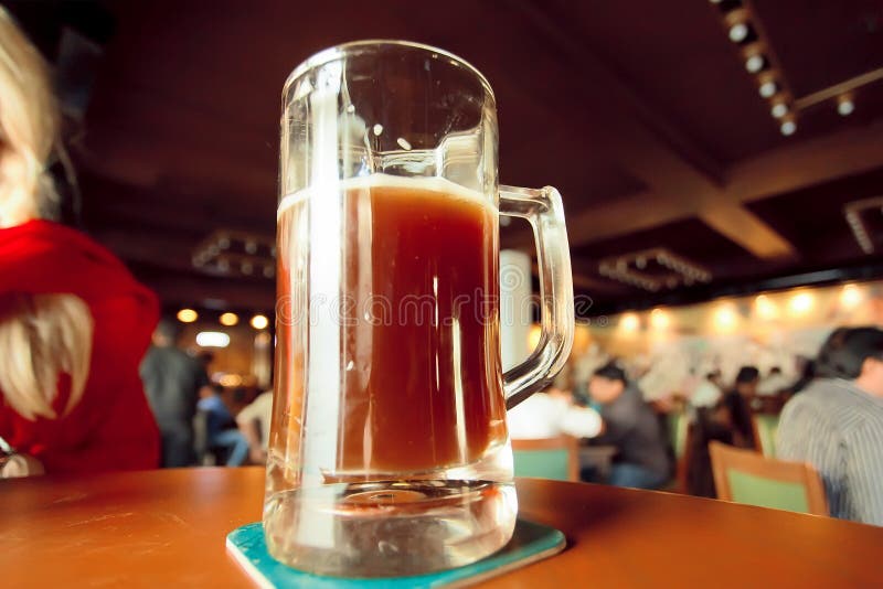 Craft Beer Mug on Bar Table of Huge Space with Drinkers and Eaters ...
