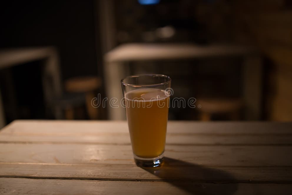 Craft Beer on a Table in the Pub Stock Photo - Image of sauce, holding ...