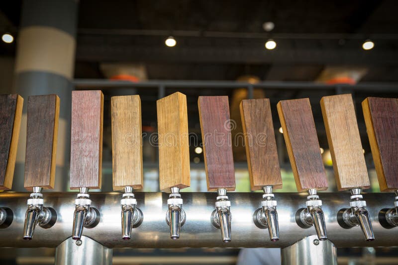 Wooden Craft Beer Taps from the Front Stock Image - Image of craft ...