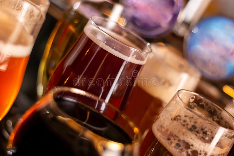 Craft beers on bar table stock photo. Image of lager - 216137100