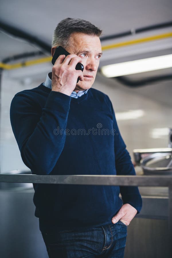 Craft Brewery Owner Talking on Mobile Phone Doing Business Stock Photo ...