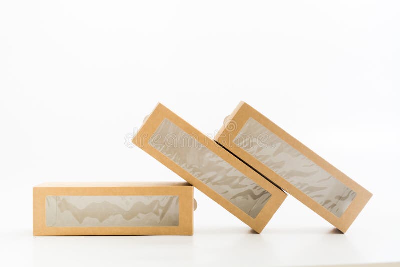Craft Brown Paper Boxes with Transparent Window on White Background ...