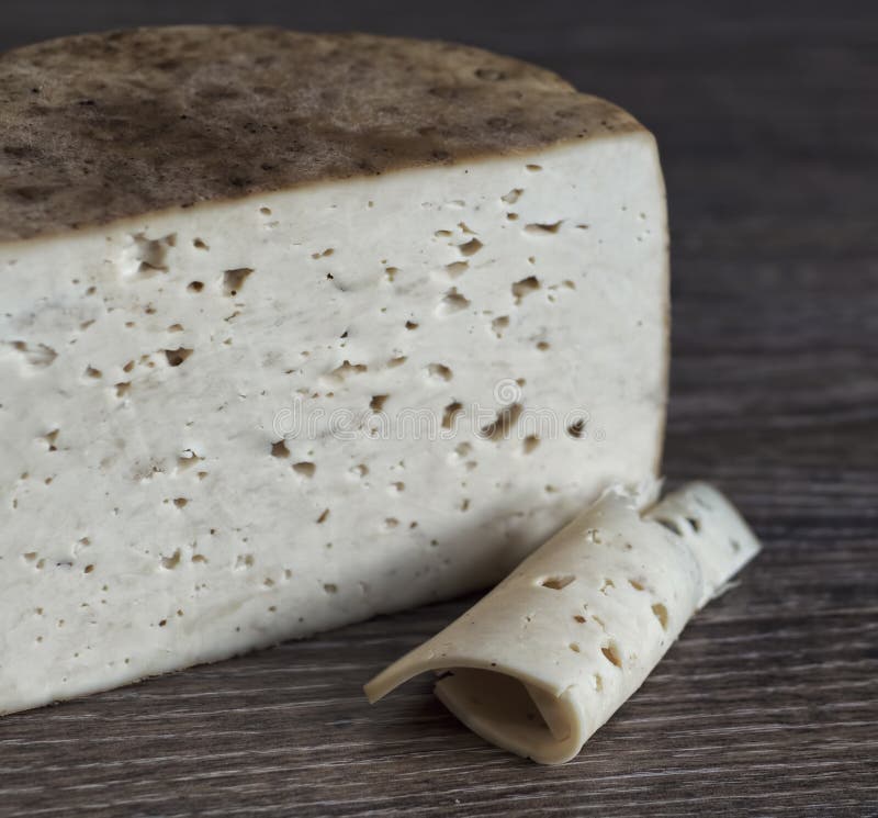 Craft Cheese from Cows and Goats Milk. Cheese Head. Selective Focus ...