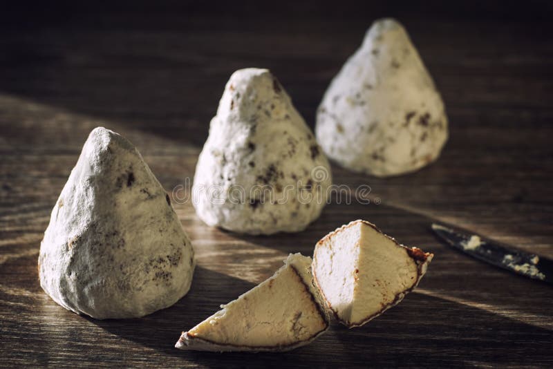 Craft Cheese from Cows and Goats Milk. Cheese Head Stock Photo - Image ...