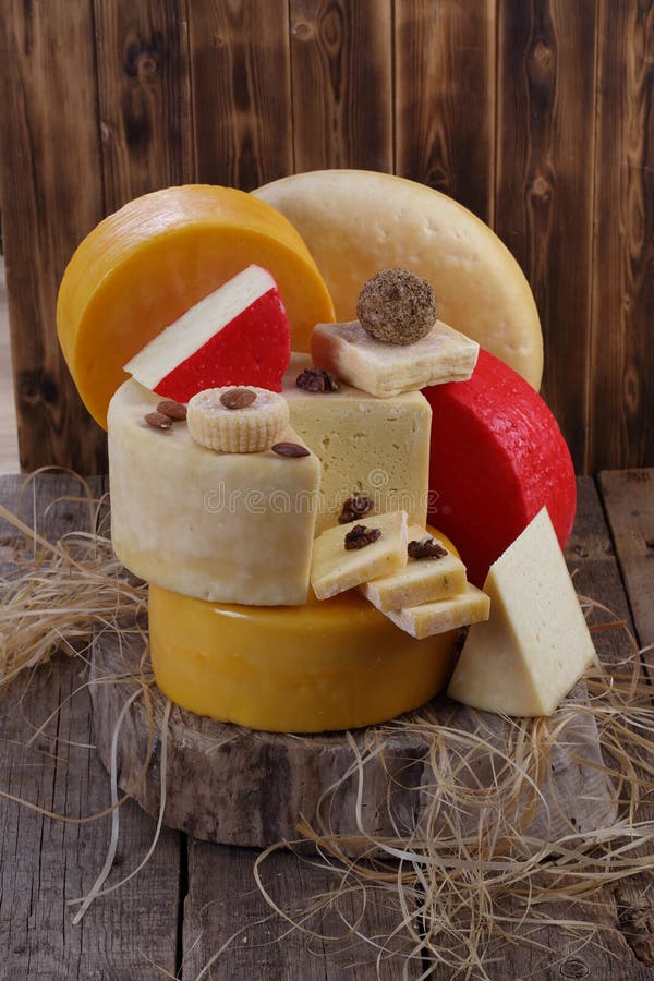 Craft Cheeses on a Wooden Table Stock Image - Image of farm, labor ...