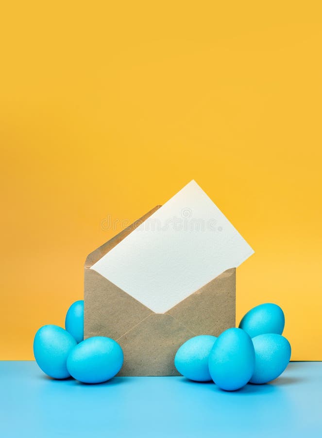 Craft Envelope with a Sheet of Paper and Easter Eggs on a Yellow ...