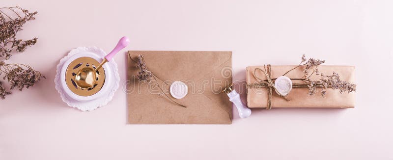 Craft Envelope with Wax Seal and Crafting Items on Pink Top View Web ...