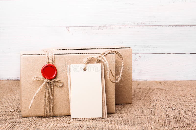 Craft Gift Box, Tied with String with a Bow and Autumn Fallen Leaves on ...