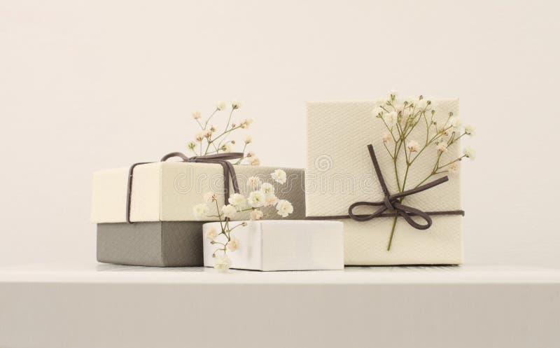 Craft Gift Boxes with Flower on Light Beige Wall Copy Space Background ...