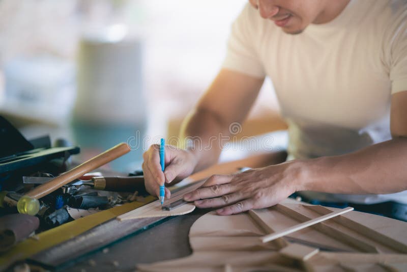 Craft Man Making Guitar on Wood Table, Capenter Working Concept Stock ...