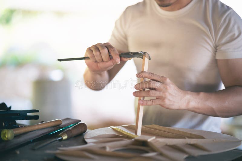 Craft Man Making Guitar on Wood Table, Capenter Working Concept Stock ...