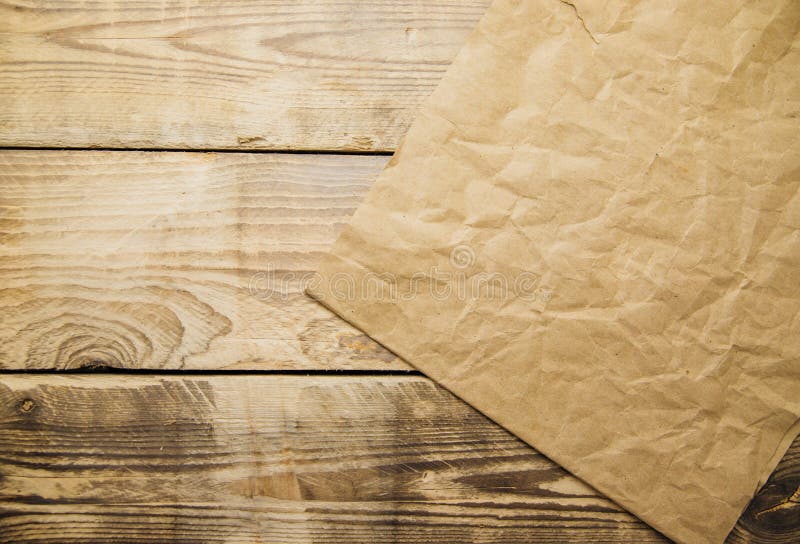 Craft Paper on a Wooden Background.Crumpled Paper, Rough Surface Stock ...
