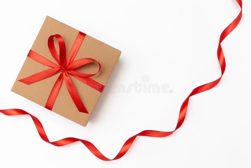 Craft Present Box with Red Bow and Red Ribbon on the White Background ...