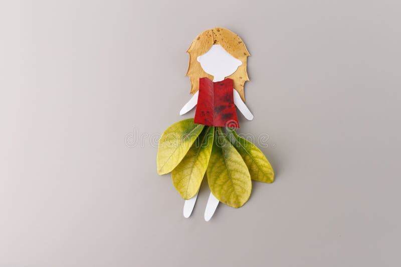 A Craft Project Involving a Paper Cutout Figure with Additional ...