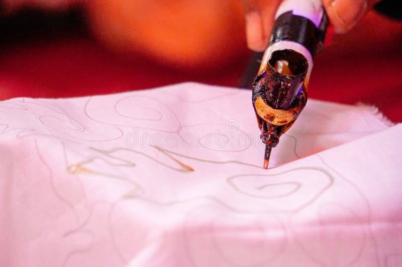 Crafter is Making Batik Patterns on Fabric Using a Tool Called a ...
