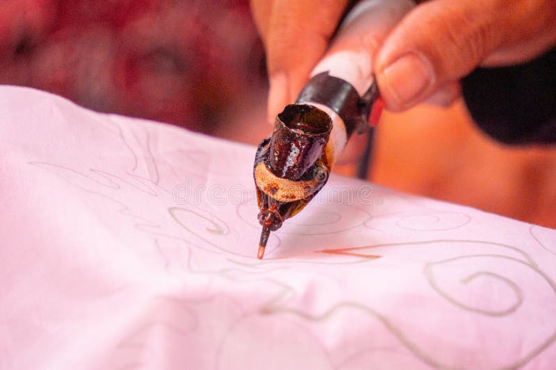 Crafter is Making Batik Patterns on Fabric Using a Tool Called a ...