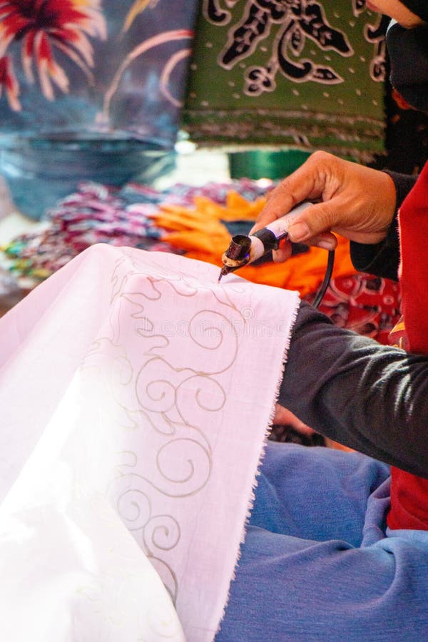 Crafter is Making Batik Patterns on Fabric Using a Tool Called a ...