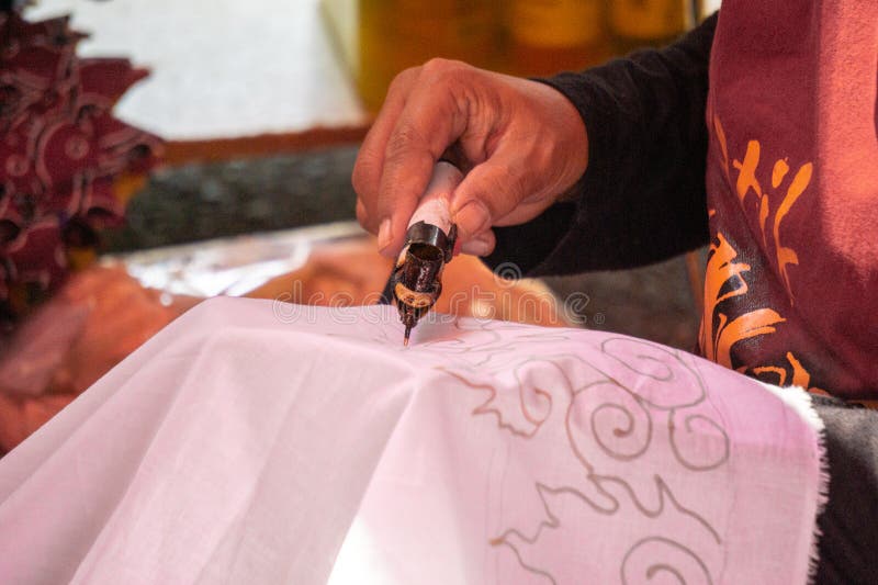 Crafter is Making Batik Patterns on Fabric Using a Tool Called a ...