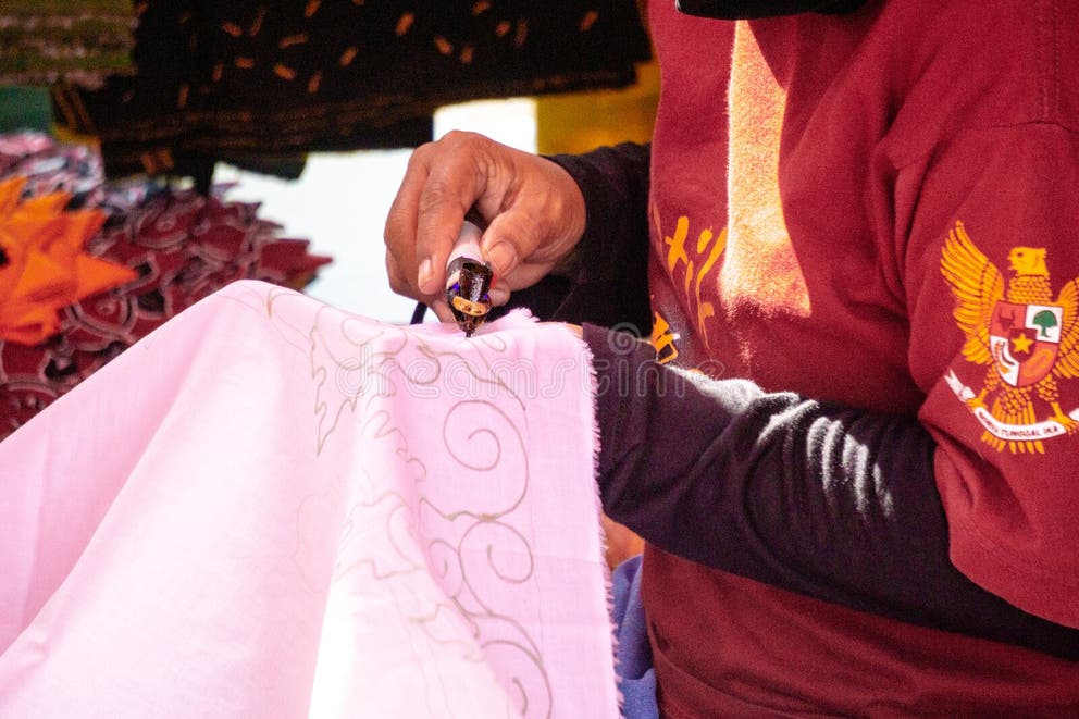 Crafter is Making Batik Patterns on Fabric Using a Tool Called a ...