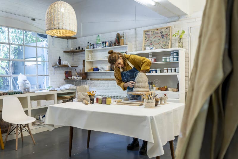 Crafting Beauty in a Vibrant Pottery Studio Stock Image - Image of ...