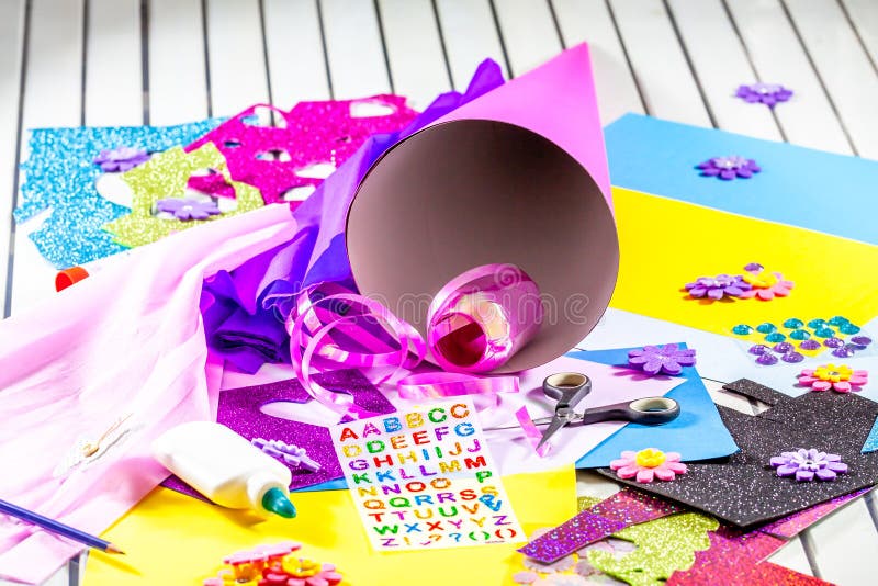 Crafting a Candy Cone from Paper for the First Day of School Stock ...