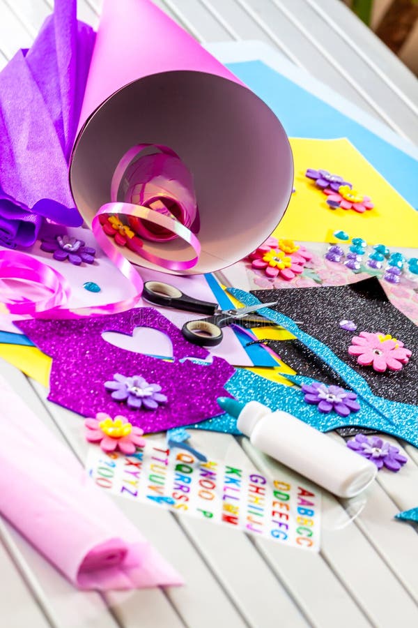 Crafting a Candy Cone from Paper for the First Day of School Stock ...