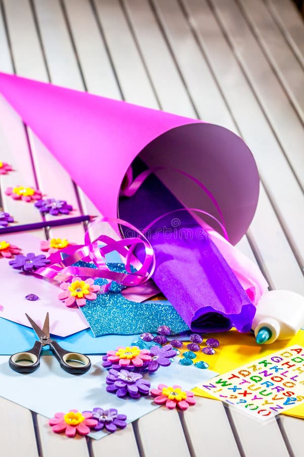 Crafting a Candy Cone from Paper for the First Day of School Stock ...