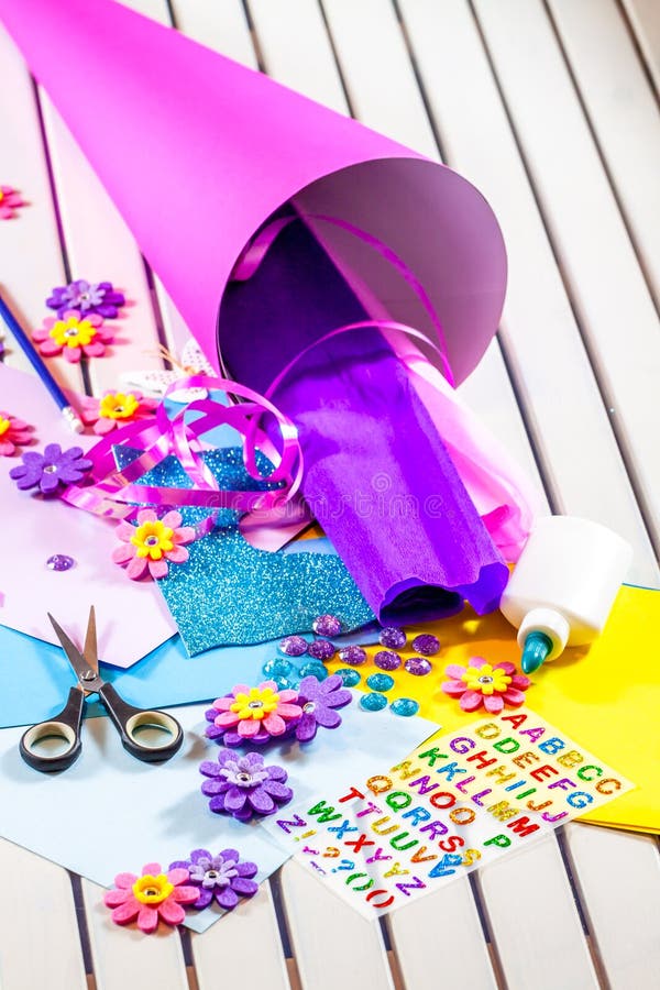 Crafting a Candy Cone from Paper for the First Day of School Stock ...